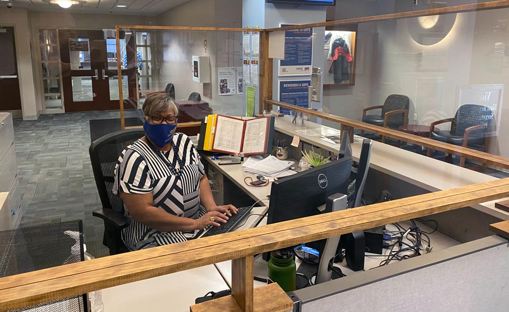 Handyman helps guard employees against sneezes and other hazards ...